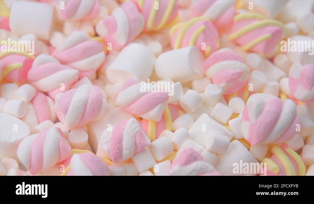 Marshmallow colorful chewy candy backdrop, rotation, marshmallows ...