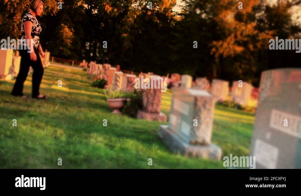 Mourning in cemetery Stock Videos & Footage - HD and 4K Video Clips - Alamy