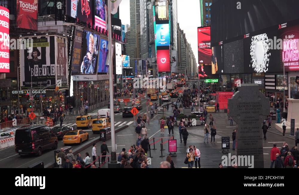 Times Square view of people and screens Stock Video Footage - Alamy