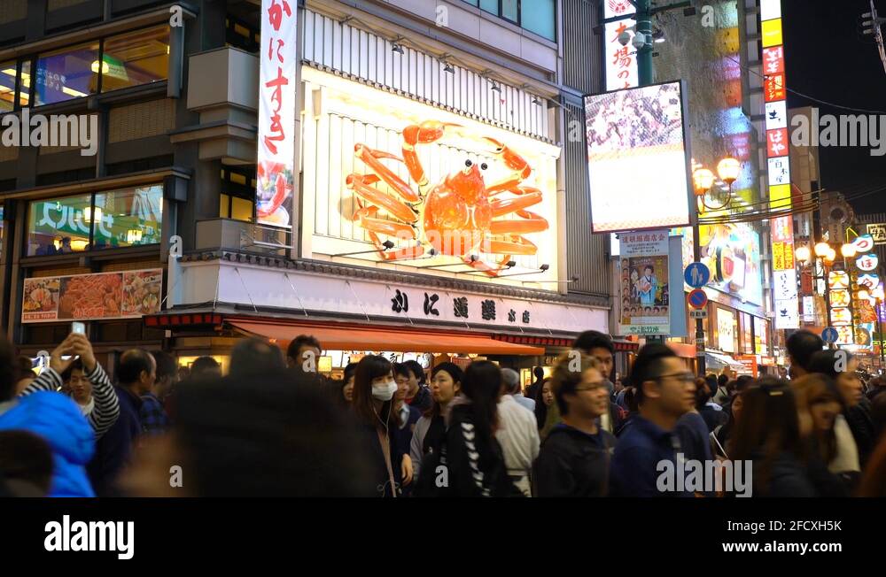Osaka Japan, circa : crowded people at Osaka night street market ...