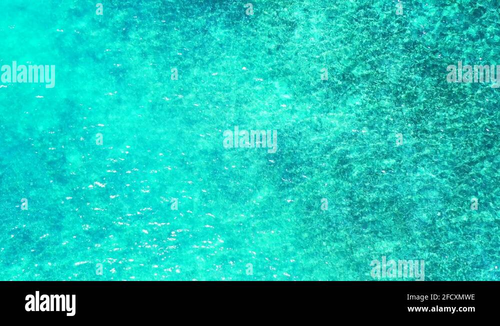 abstract water texture, shallow tropical sea , maldivian island flying ...