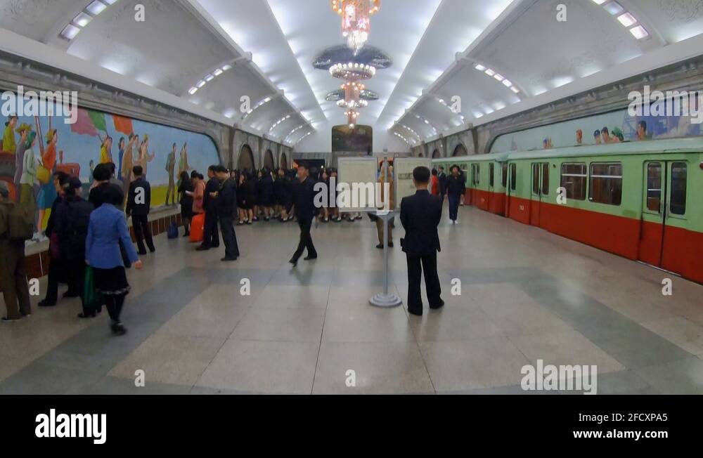Passengers admiring the stunning murals in Puhung Metro Station before ...