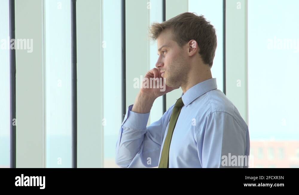 Office building with man looking out window Stock Videos & Footage - HD ...