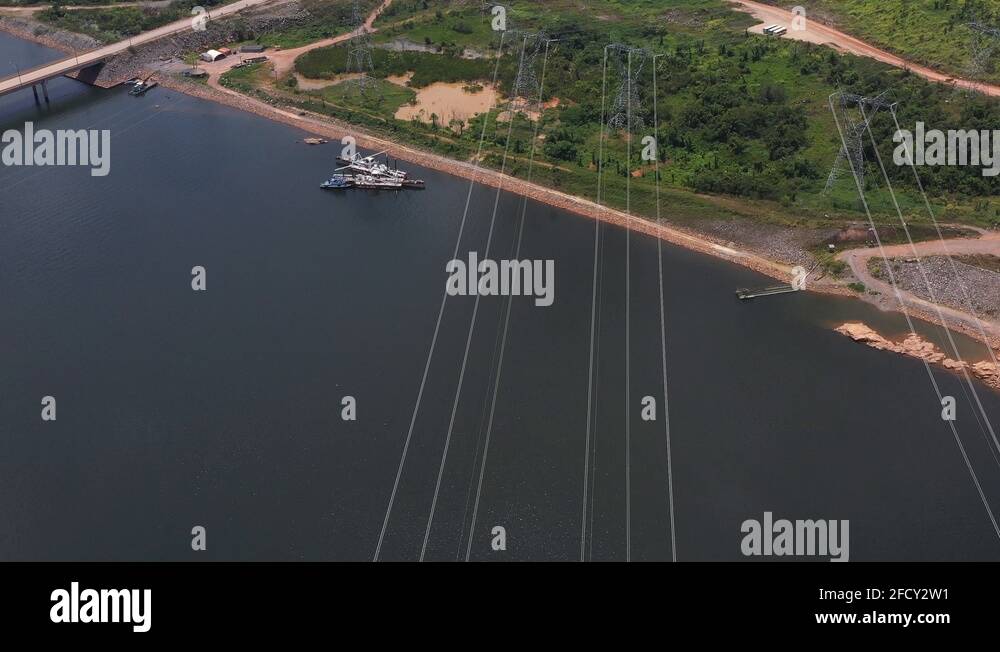 Electrical transmission lines crossing river Stock Videos & Footage ...