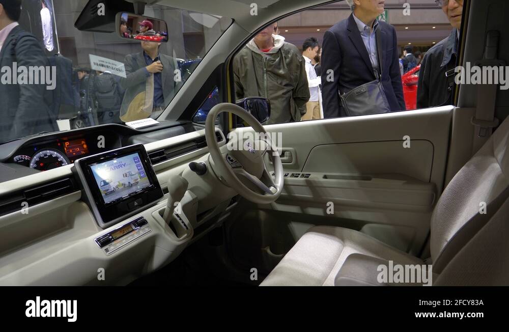 People Looking Inside a Car at Tokyo Motor Show in Japan Stock Video ...
