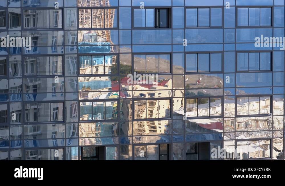 Reflection of the City in the Windows of a Modern Building Stock Video ...