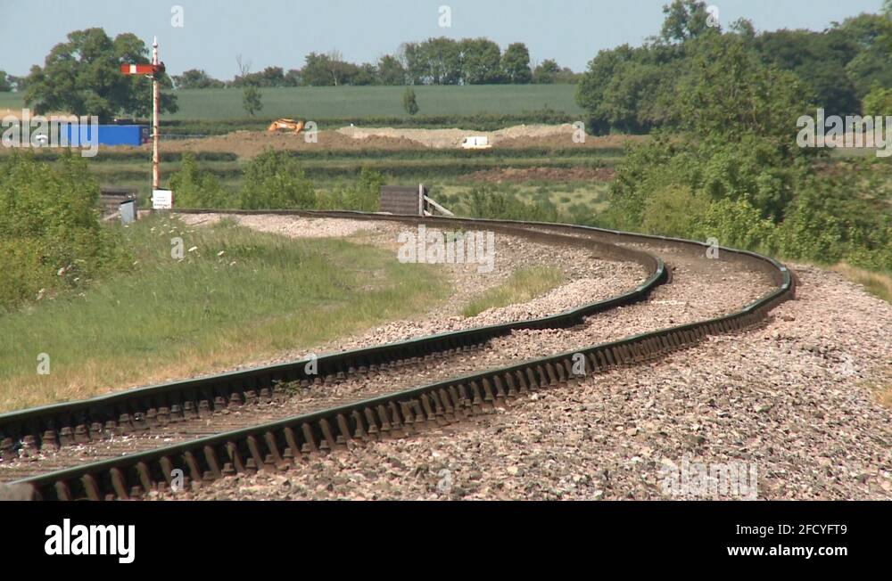 Vintage Steam Train on a Sharp Corner Stock Video Footage - Alamy