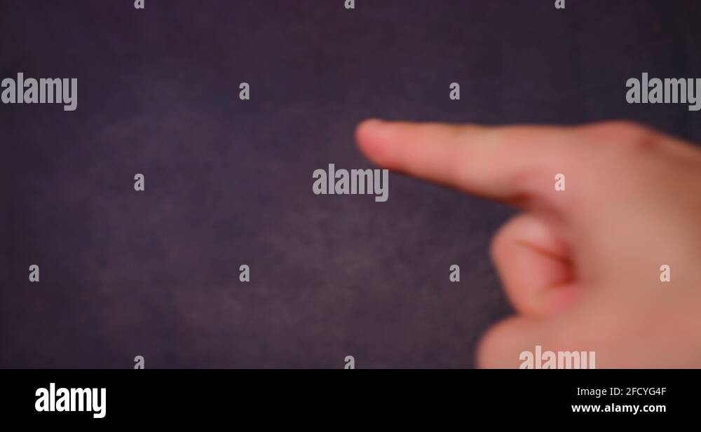 Man's hand pointing with one finger to front of gesture captured from ...