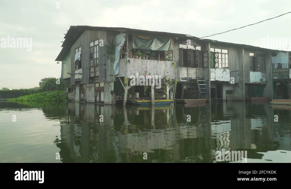 A floating house in the poverty-stricken slums of the Artex Compound ...