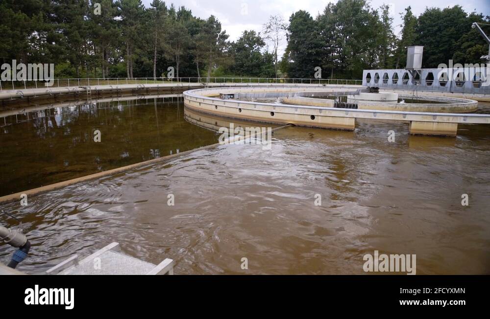 Secondary sedimentation tank of a sewage treatment plant - Camera pan ...