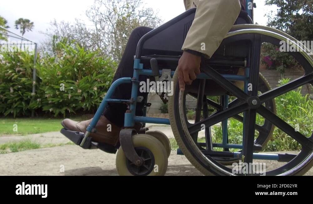 Person in a wheelchair Stock Videos & Footage - HD and 4K Video Clips ...