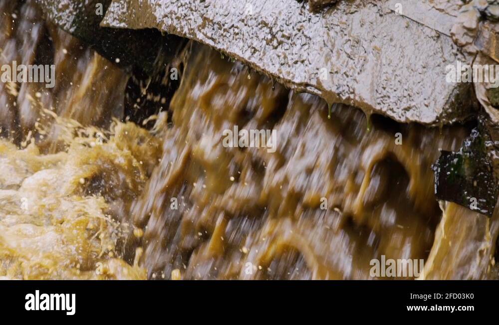 Dirty water arrives through pipes in a sewage treatment plant - Slow ...