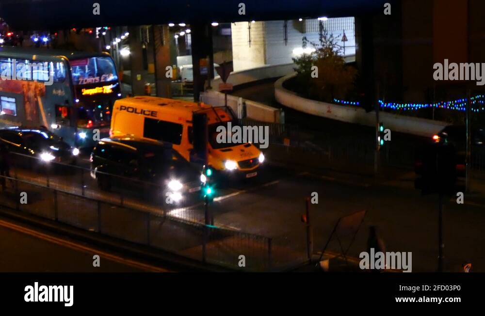 Police van in Liverpool city centre parked at city traffic lights ...