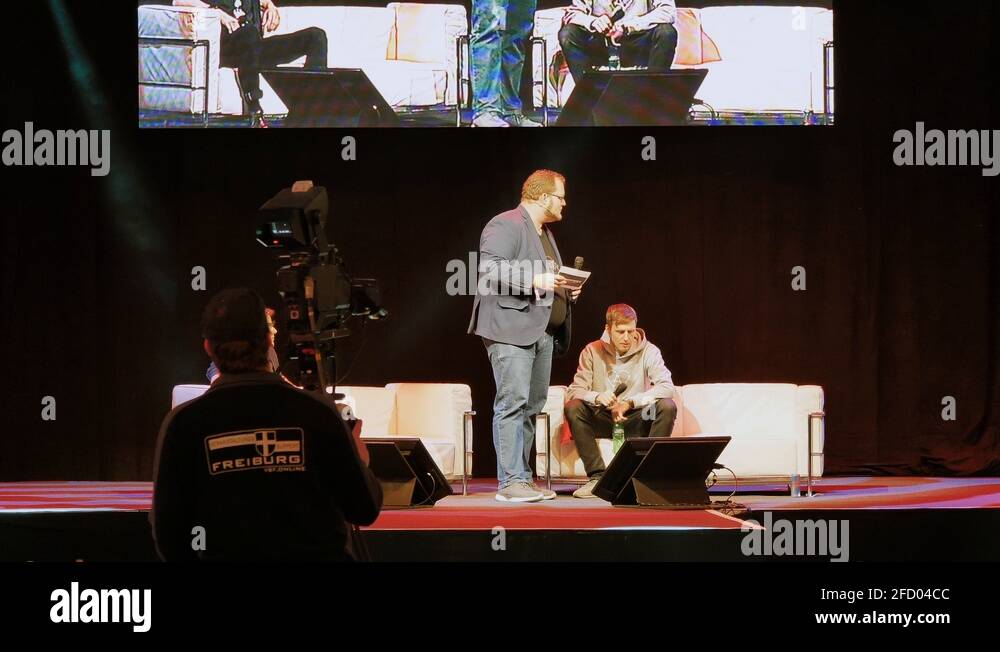 live broadcast on big screen of an interview with players of a video ...