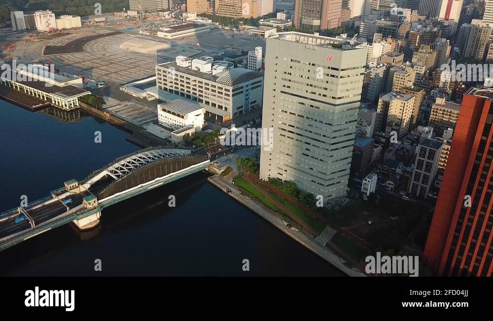 Tilt Up Aerial View of Tokyo Japan and Sumida River Bridge on Summer ...