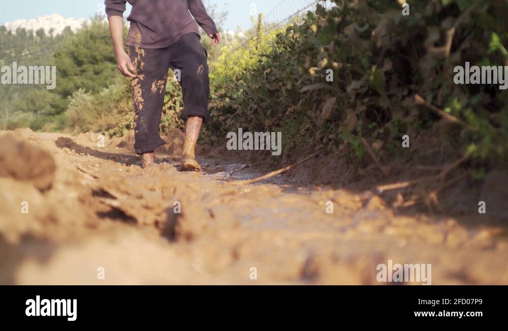 Walking barefoot in the mud Stock Videos & Footage - HD and 4K Video ...