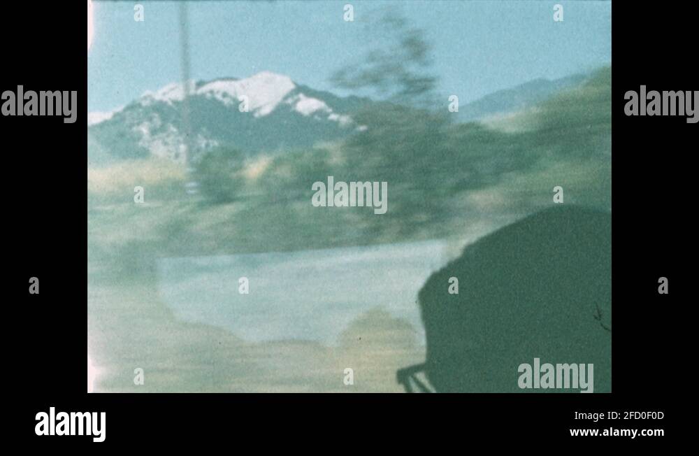 1940s: View from a moving train window of coastal scenes, including ...