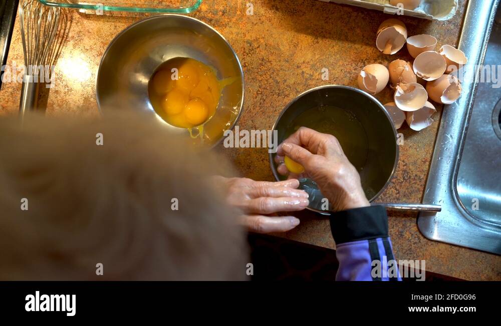 Egg woman elderly Stock Videos & Footage - HD and 4K Video Clips - Alamy