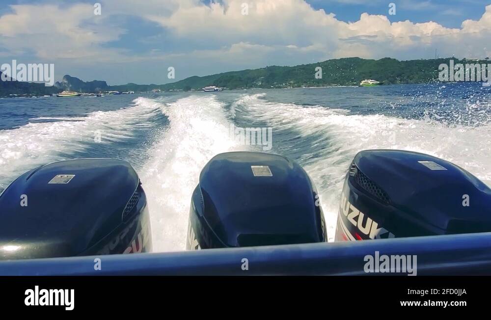 The three Suzuki high powered motors running on the the back of the ...