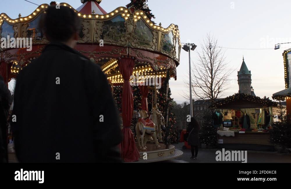 Famous carousel at Winterlight Festival and famous bank building (BCEE ...