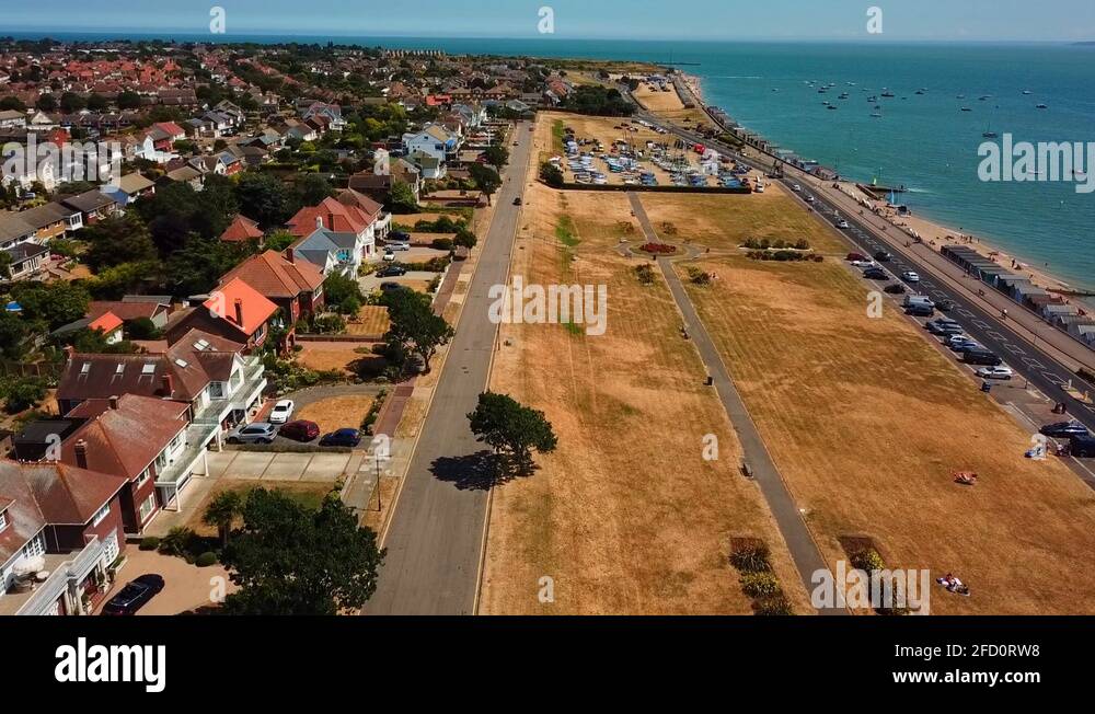 Drone footage over Thorpe bay green opposite the beach. Hot summer ...