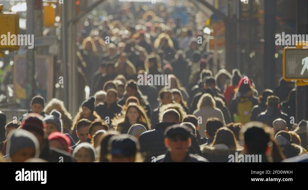 Crowd of people walking street slow motion backlit New York City Stock ...