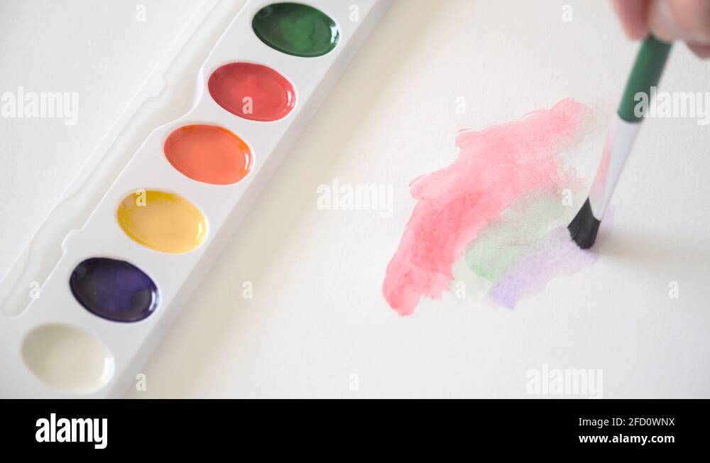 Painter using multi color palette to create a paining Stock Video ...