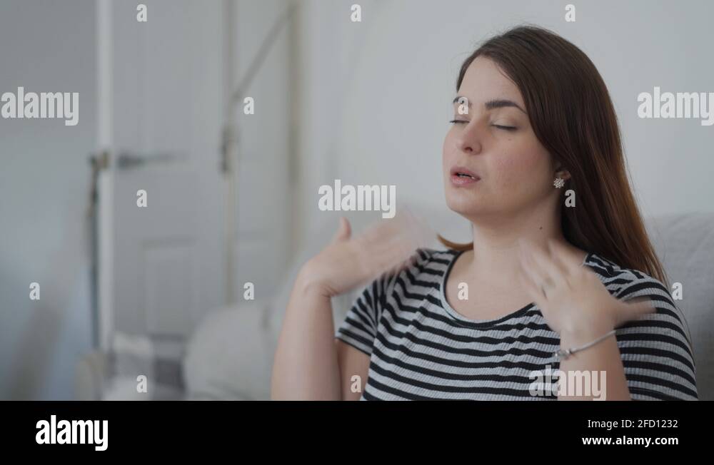 Woman fanning hands Stock Videos & Footage - HD and 4K Video Clips - Alamy