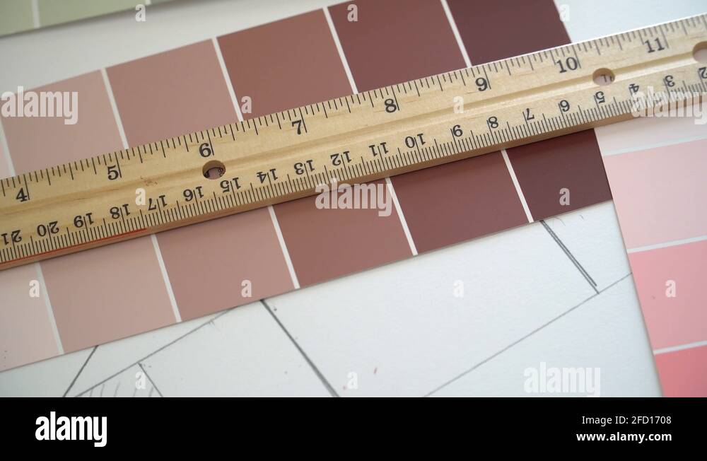 Ruler,color swatches and pencil used to create and draw a home on an ...