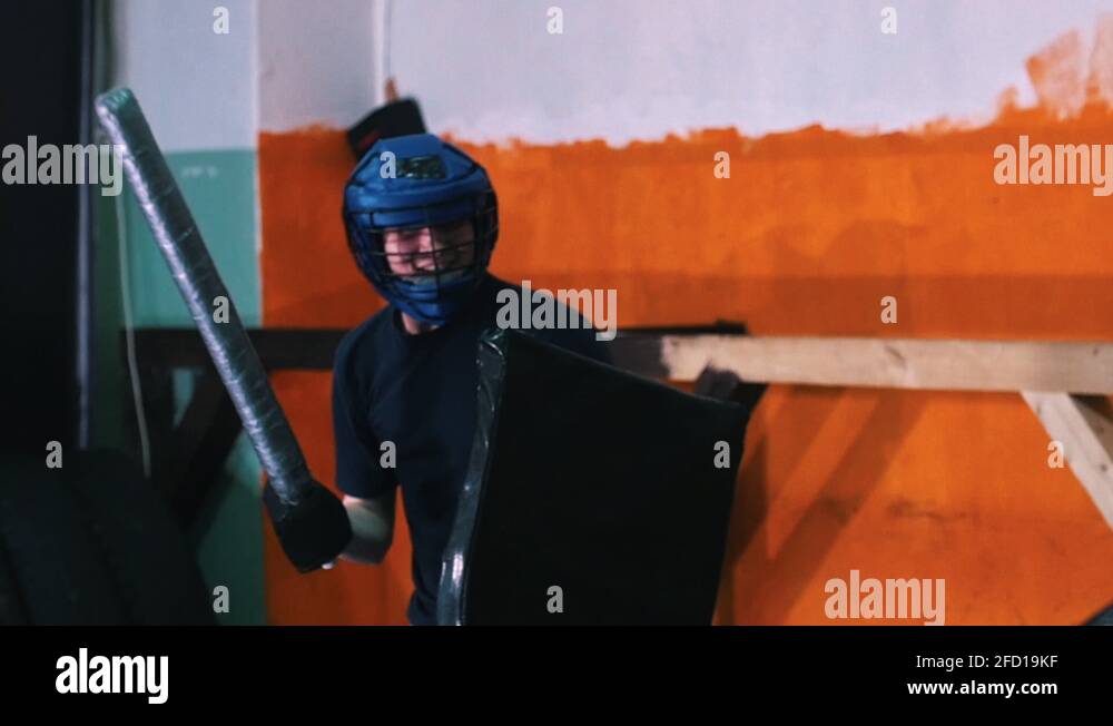 Knights training - Two men having a training fight in the gym using a ...