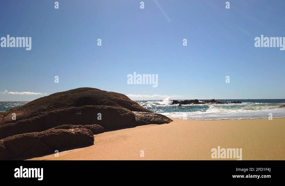 Beautiful beach scene in slow motion at Cabo San Lucas, Mexico Stock ...