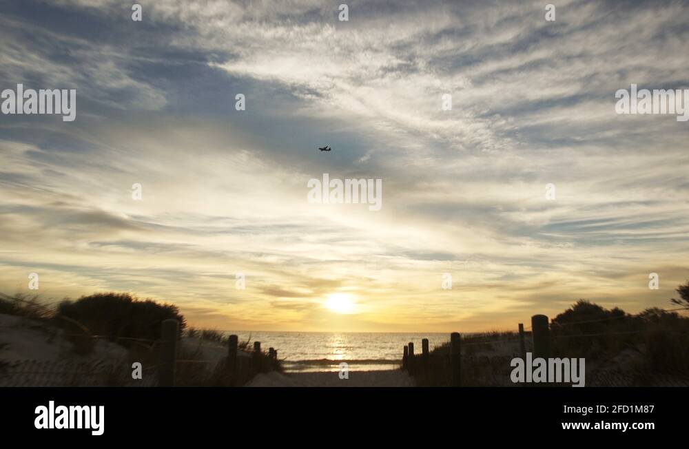 Military soldiers jump out of aircraft over the Australian Ocean at ...