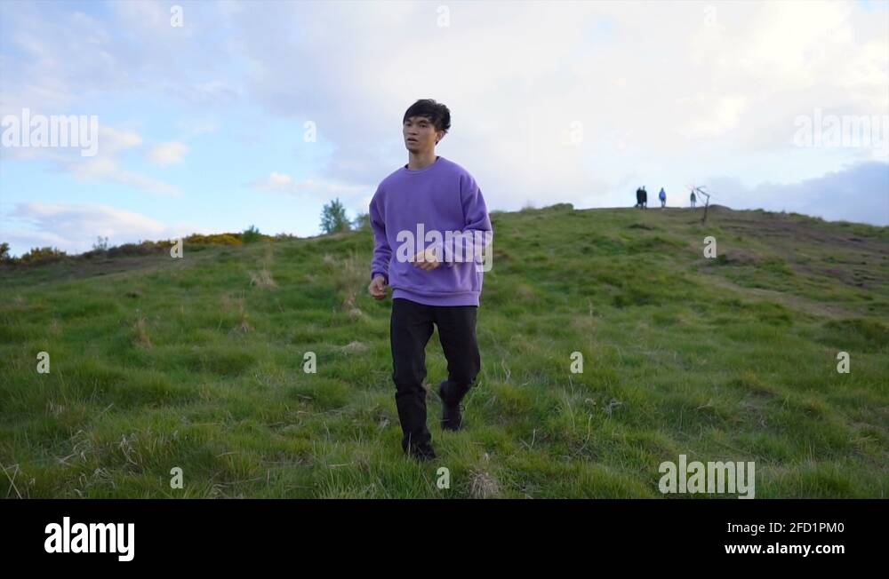 Man rolling down hill Stock Videos & Footage - HD and 4K Video Clips ...