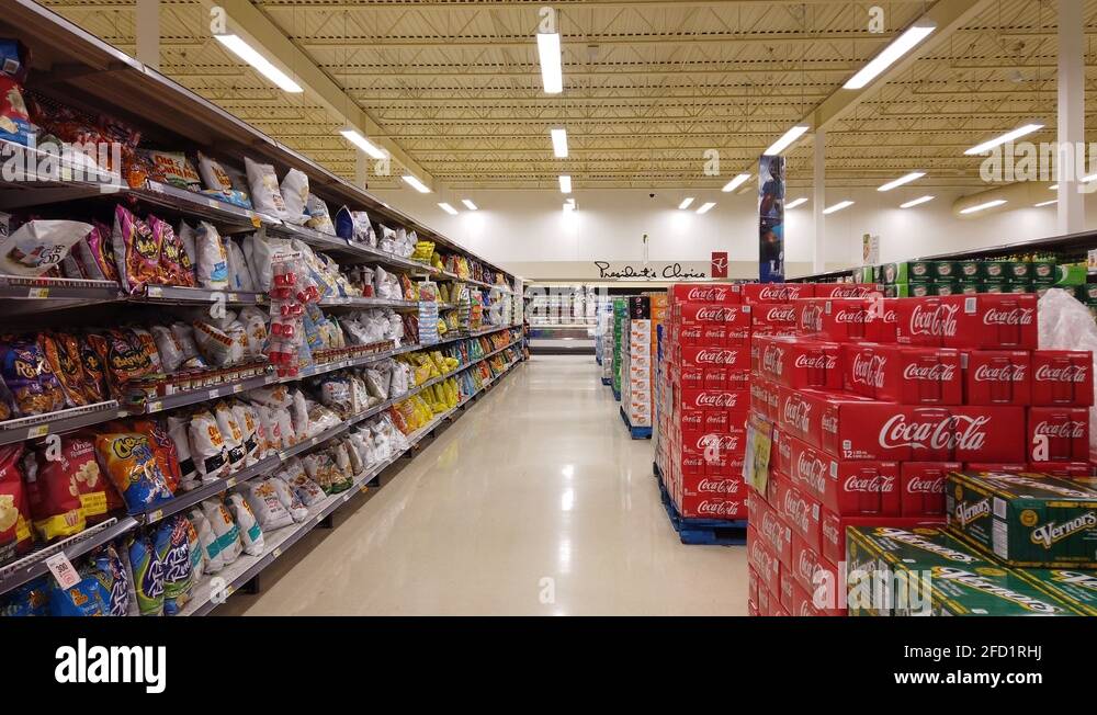 Supermarket Grocery Store Walking Down Junk Food Aisle With Potato ...