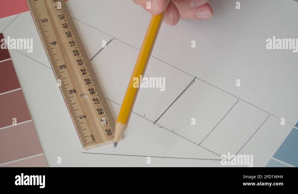 Ruler,color swatches and pencil used to create and draw a home on an ...