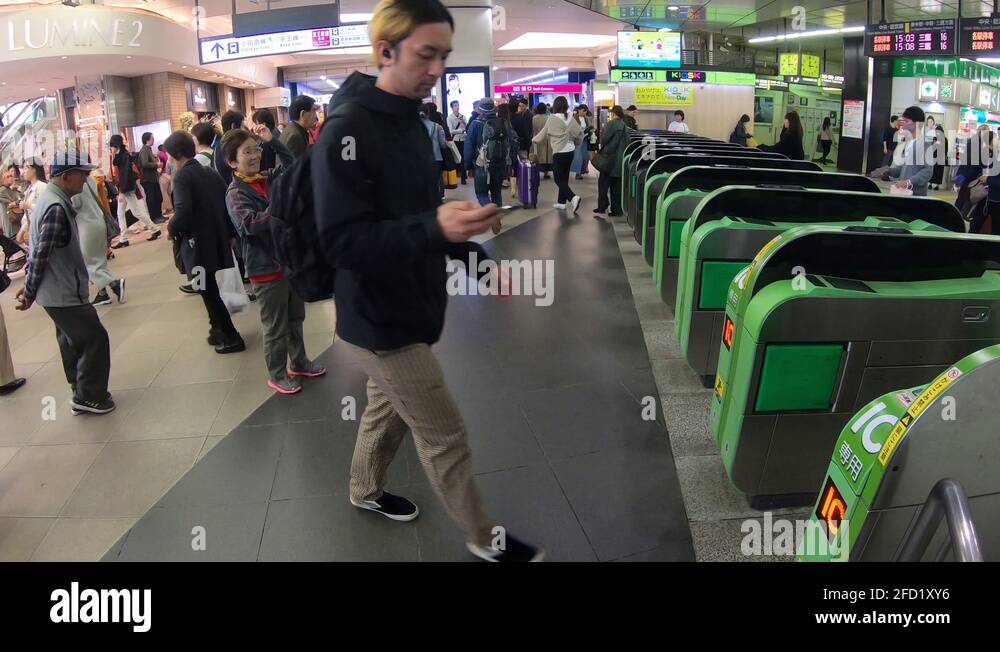 People Entering Tokyo Subway Train Gates Stock Video Footage - Alamy