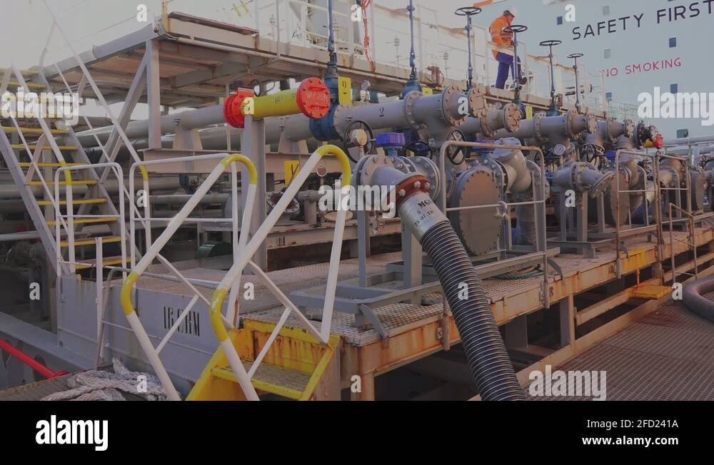 bunkering station operates on oil tanker pumping client ship Stock ...