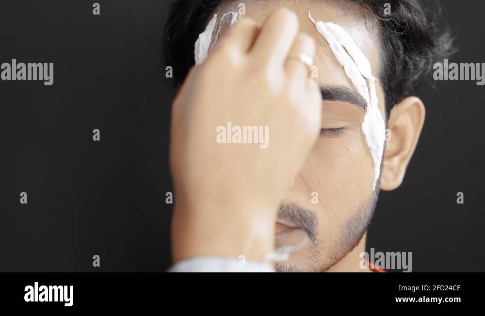 Process of making Halloween mask by putting white prosthetic insert on ...