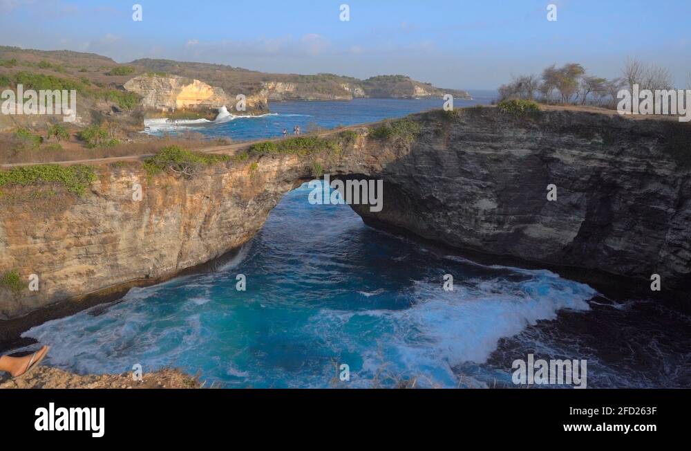 the Broken Beach, famous tourist location on the Nusa Penida island ...