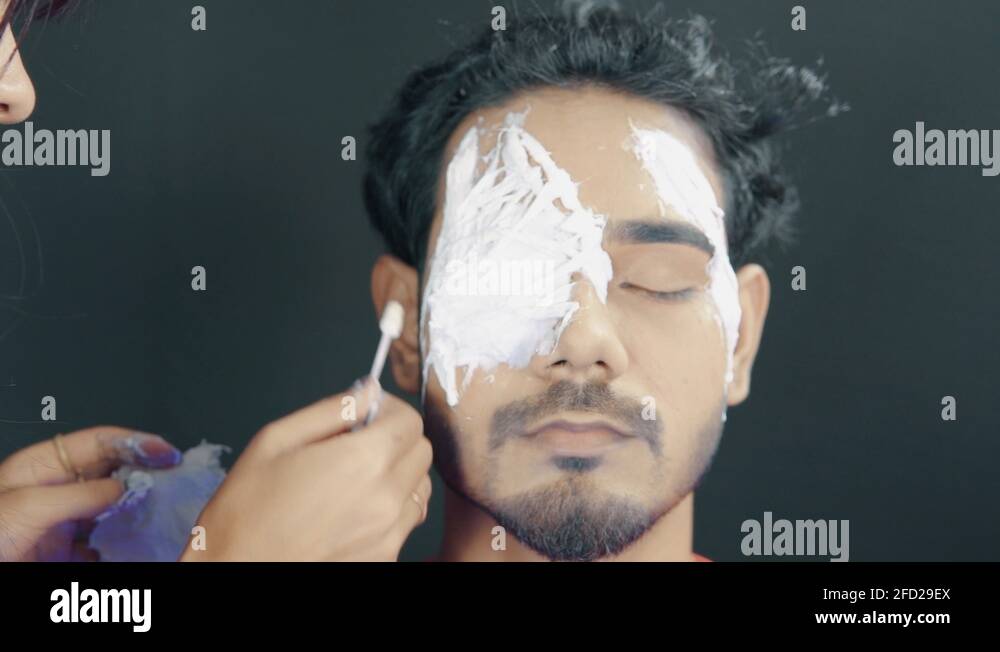 Process of making a Halloween mask by putting white prosthetic insert ...