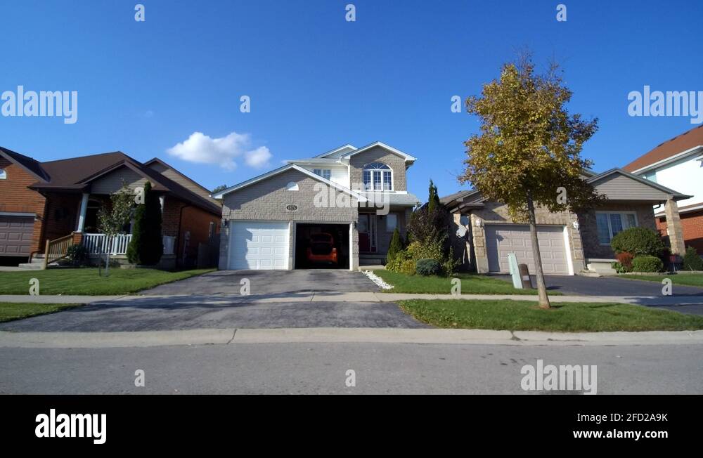 Driving Past Middle Class Neighbourhood Houses Real Estate Side View ...
