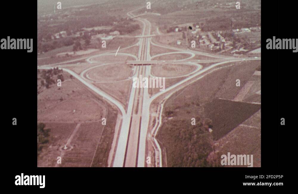 1950s: UNITED STATES: overhead view of freeway construction. Freeway ...