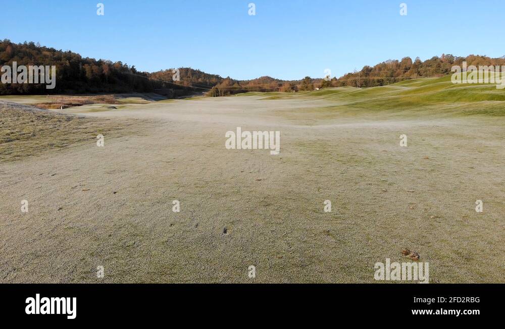 Low altitude backwards drone flight at Golf course in Kallered, Molndal ...