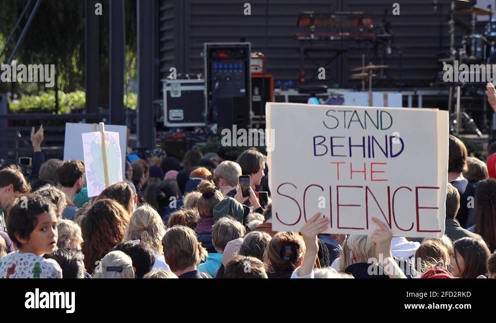 "Stand Behind the Science"-sign in crowd of people at climate rally in ...