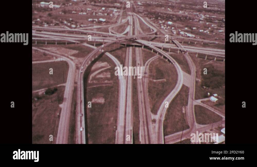 1970s: Aerial view of highway intersection. Aerial views over highways ...