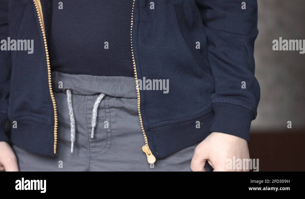 Close up of a young boy revealing a nine millimeter toy gun perfect ...