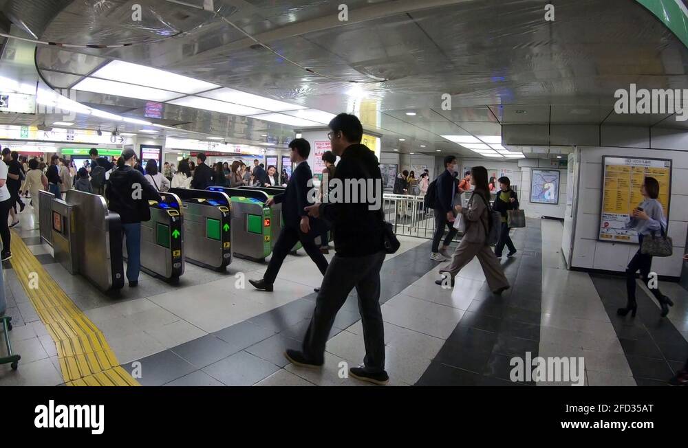 Crowd of Commuters Entering Subway Station Stock Video Footage - Alamy