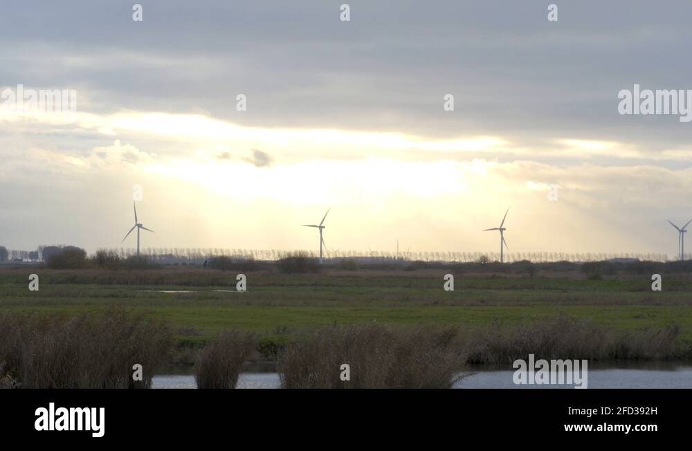 Windmills turning in wind sun Stock Videos & Footage - HD and 4K Video ...