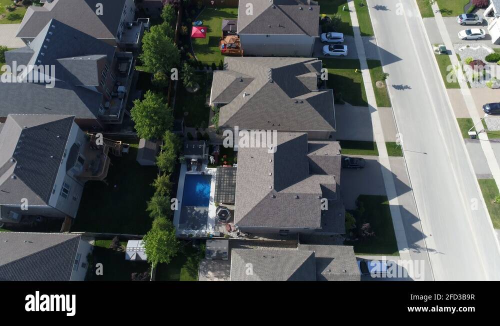 Flying Over Newly Built Homes Top Down View With Decks Gazebos Swimming ...