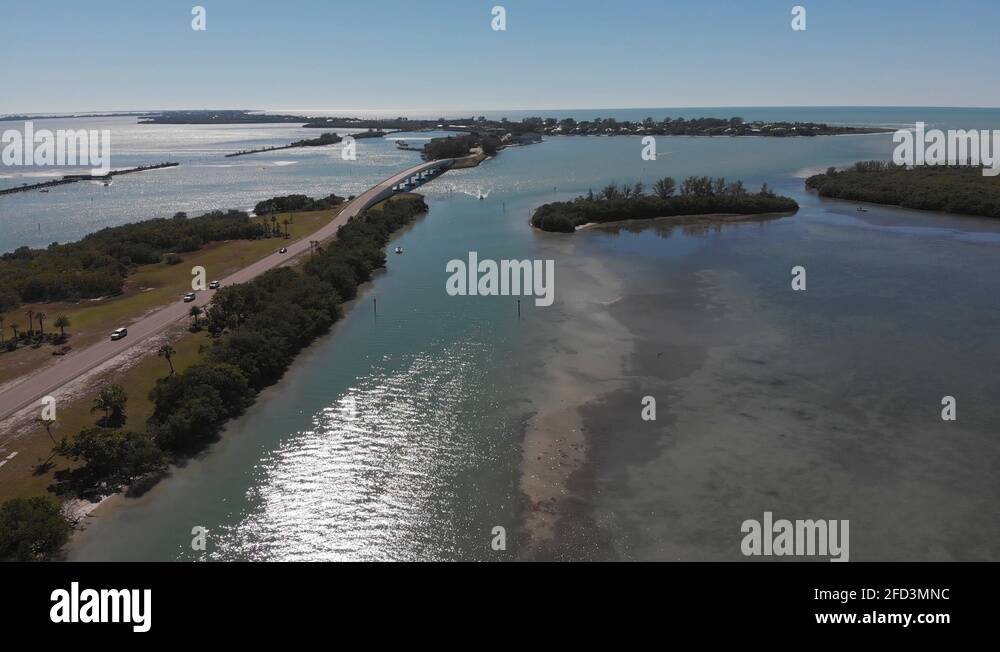 Aerial of bridge and highway leading to beautiful Boca Grand in Florida ...
